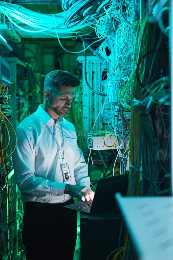 Portrait of Network Engineer in Server Room Stock Image - Image of data ...