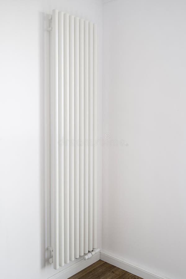 Vertical Radiator Install on White Wall in Empty Room with Minimalist ...