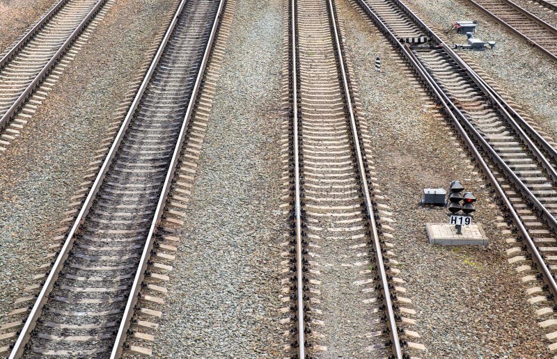 The Vertical Rails on the Railroad Stock Photo - Image of street, point ...