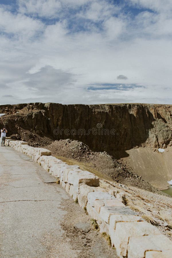 Vertical Scenic Shot of a Bumpy Road and a Mountain Great for ...