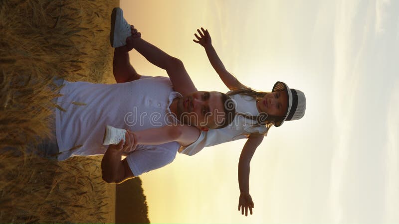Girl Sitting on Shoulders of Father Walking in Field Stock Footage ... Girl Sitting on Shoulders of Father Walking in Field Stock Footage ...