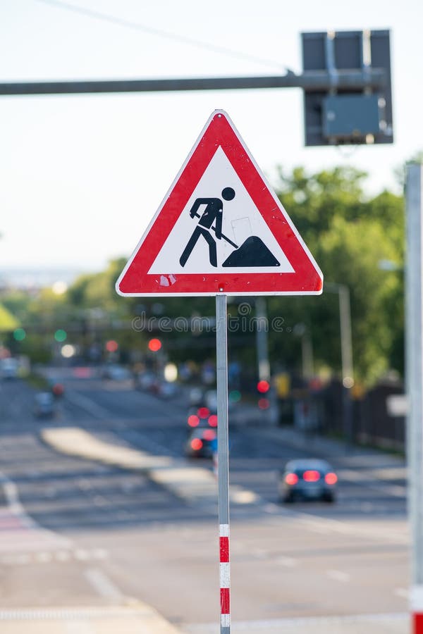 Vertical Selective Focus Shot of Under Construction Road Signage in the ...