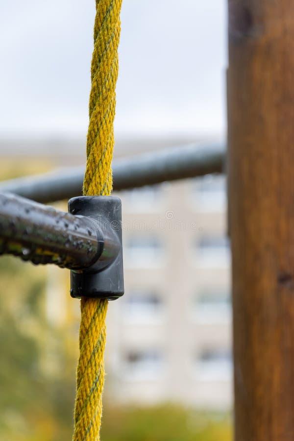 Vertical Selective Focus Shot of Yellow Barbed Wire Stock Image - Image ...