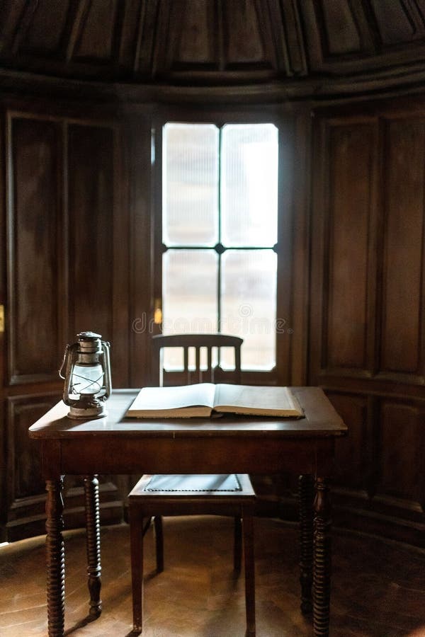 Vertical Selective Focus View of a Reading Table and Chair with an ...