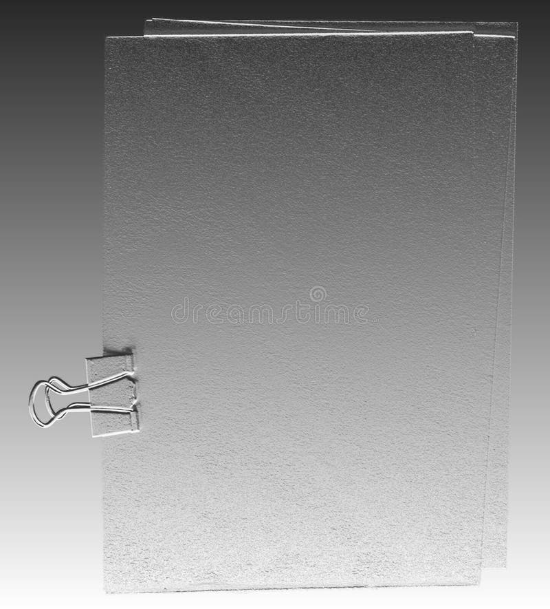 Vertical Sheets of Paper with a Clip on a Gray Background Stock Image ...