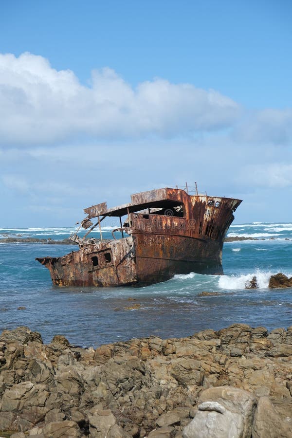 Vertical of a Shipwreck in Seascape Coastline Hulk of a Cargo Ship ...