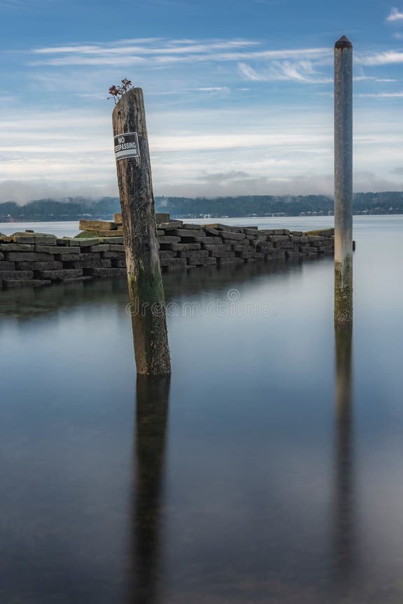 Vertical Shor of Pillars in the Smooth Water Stock Image - Image of ...