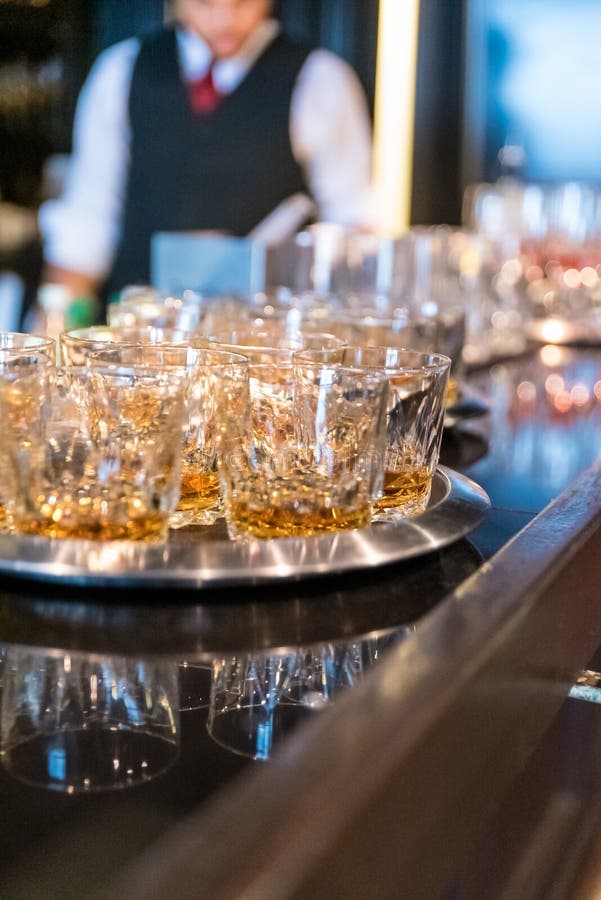 Vertical Shot of Alcohol Drinks in a Metal Tray at a Wedding Reception ...