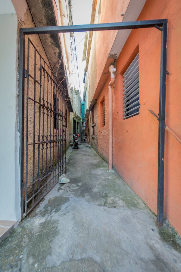 Vertical Shot of an Alley between Town Buildings Stock Image - Image of ...