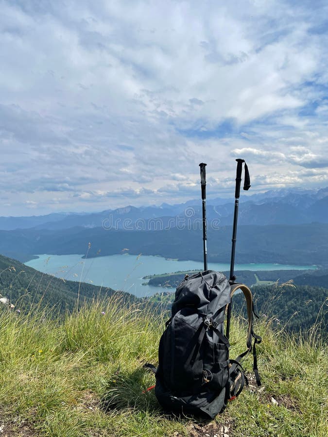 Vertical Shot of Alpine Lake Walchensee with a Backpack and Trekking ...