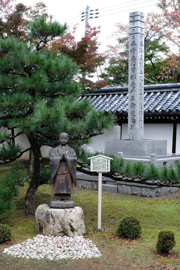 Vertical Shot of an Ancient Statue in Shiga, Japan Editorial Photo ...
