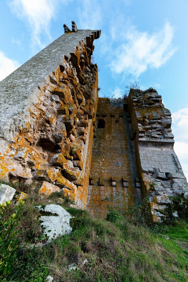 Vertical Shot of an Antique Stone Building Ruins in the Daylight Stock ...