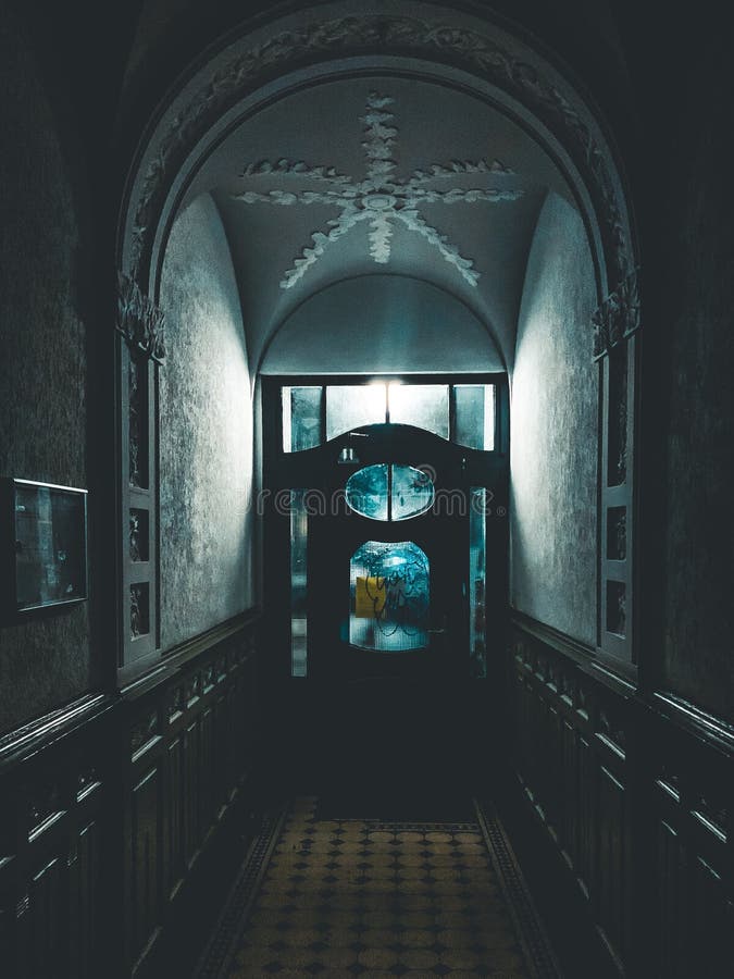 Vertical Shot of Arched Corridor with Entrance Door Stock Photo - Image ...