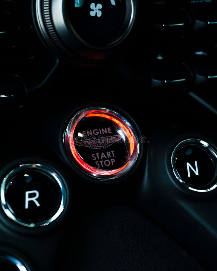 Vertical Shot of an Aston Martin Crystal Engine Start and Stop Button ...