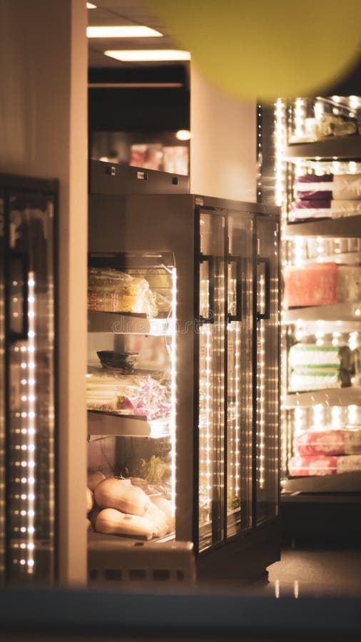Vertical Shot of a Bakery at Night Full of Cakes Editorial Image ...