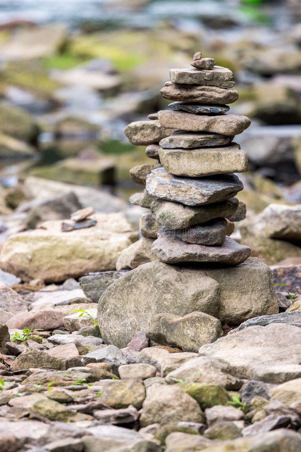 Vertical Shot of Balanced Rough Rocks on a Ground Stock Image - Image ...