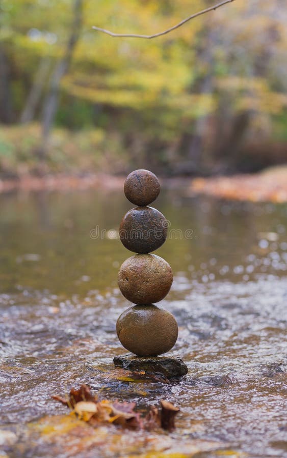 Vertical Shot of Balancing Stones by the River Stock Image - Image of ...