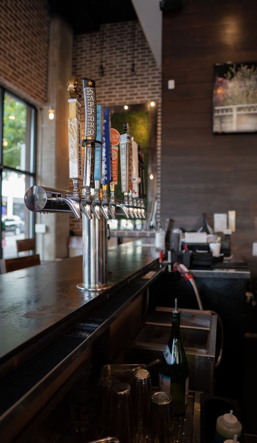 Vertical Shot of Bar Tap at a Restaurant Editorial Image - Image of ...