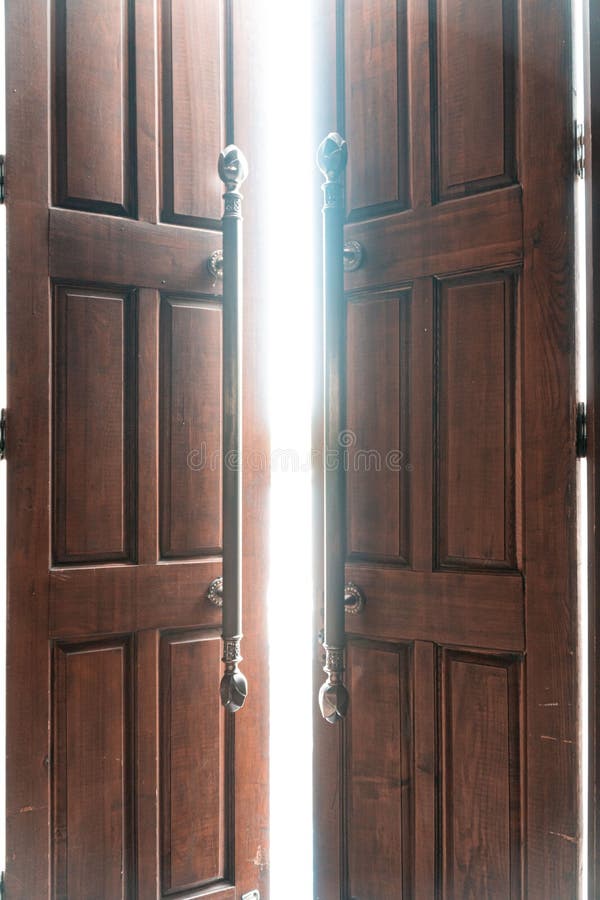 Vertical Shot of a Barely Open Wooden Gate Stock Photo - Image of ...