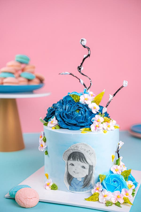 Vertical Shot of a Beautiful Blue Cake Decorated with Flowers Editorial ...