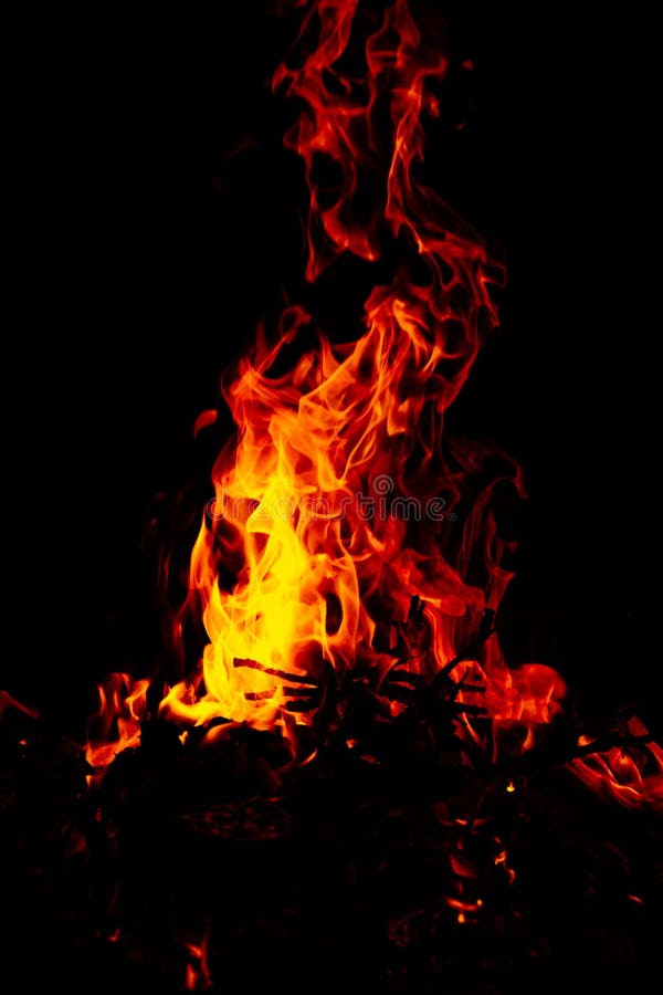 Vertical Shot of a Beautiful Burning Fire at Night Stock Photo - Image ...