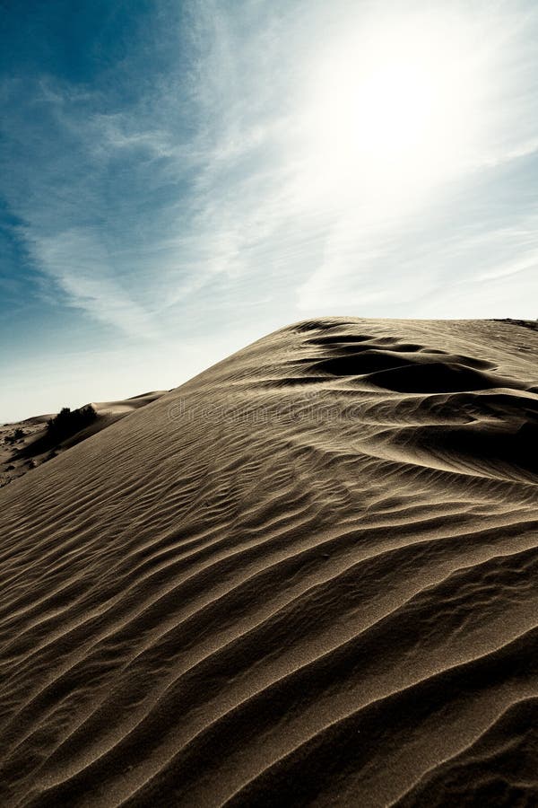 Vertical Shot of a Beautiful Desert Landscape with Sand Dunes in Dubai ...