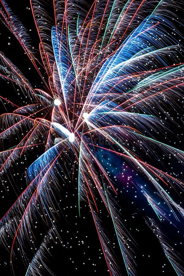 Vertical Shot of Beautiful Fireworks in the Night Sky Stock Photo ...