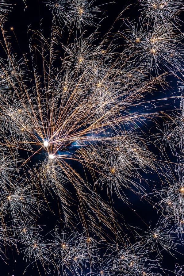 Vertical Shot of Beautiful Fireworks in the Night Sky Stock Photo ...