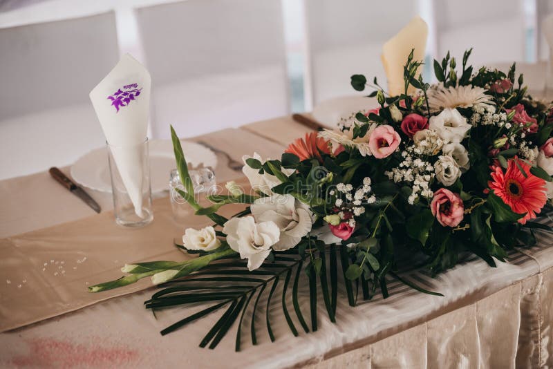 Vertical Shot of Beautiful Floral Decorations at a Wedding Editorial ...