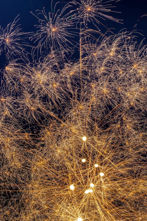 Vertical Shot of Beautiful Golden Fireworks in the Night Sky Stock ...