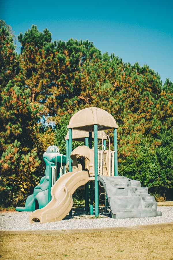 Vertical Shot of a Beautiful Playground in the Forest Stock Photo ...