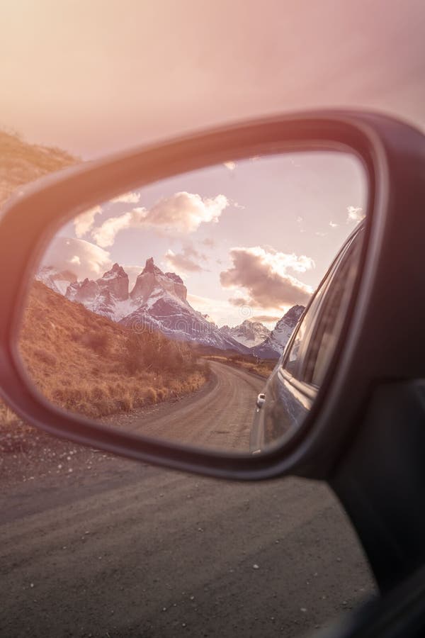 Vertical Shot of a Beautiful Scenery of Snowy Mountains Reflected in ...