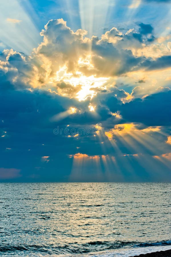 Vertical Shot of a Beautiful Sky with Sun Rays Stock Photo - Image of ...