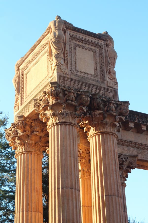 Vertical Shot of the Beautiful Statues and Columns of an Old Building ...
