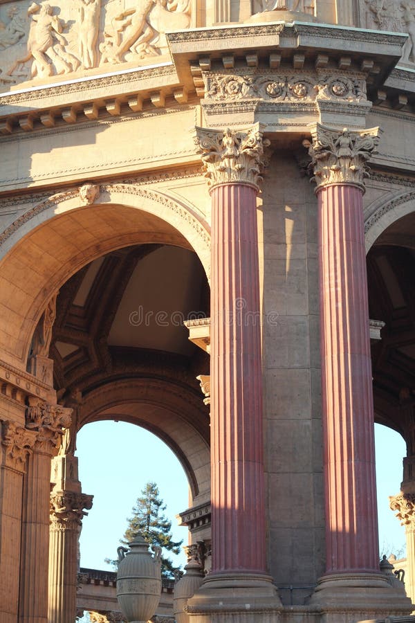Vertical Shot of the Beautiful Statues and Columns of an Old Building ...