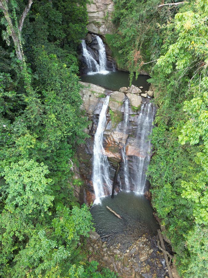 Vertical Shot of Beautiful Two Waterfalls with Surrounding Jungle Stock ...