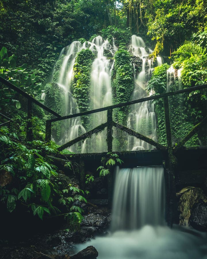 Vertical Shot of a Beautiful Waterfall in Bali, Indonesia Stock Photo ...