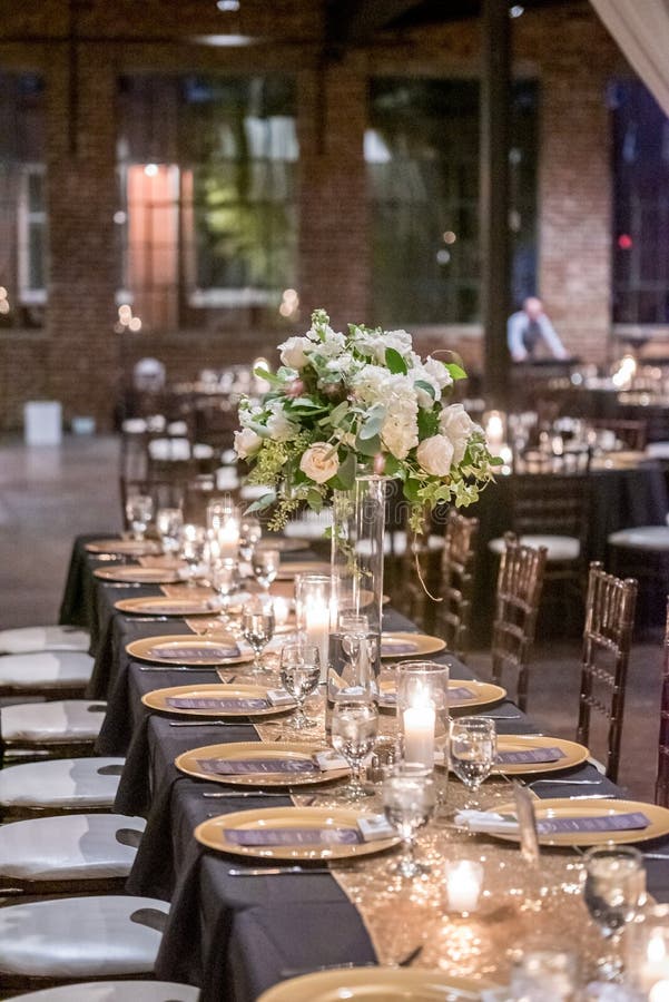 Vertical Shot of a Beautiful Wedding Hall with Elegant Table Setting ...