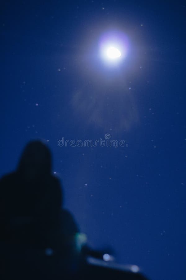 Vertical Shot of the Beautiful White Moon Shining in the Blue Sky Full ...