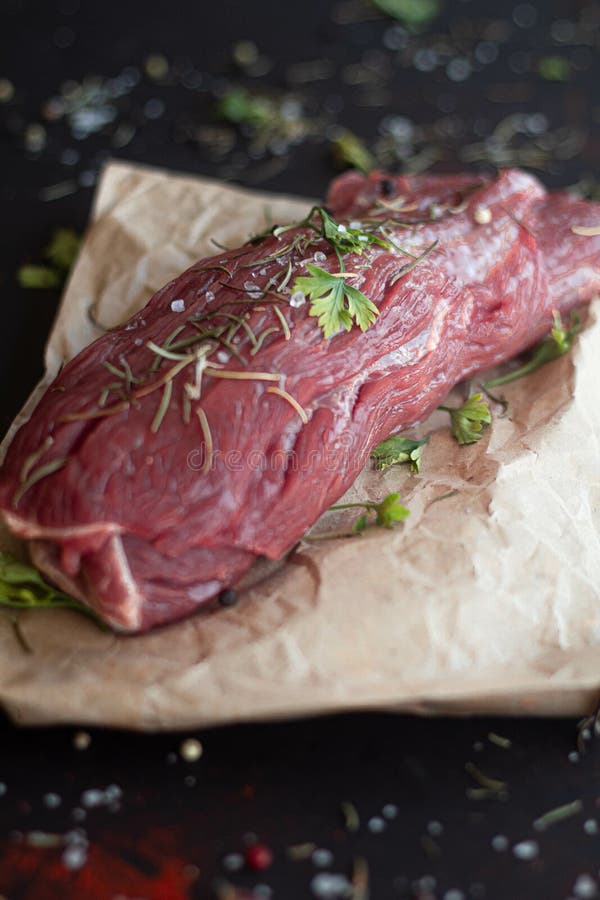 Vertical Shot of Beef on a Board in a Kitchen Stock Image - Image of ...