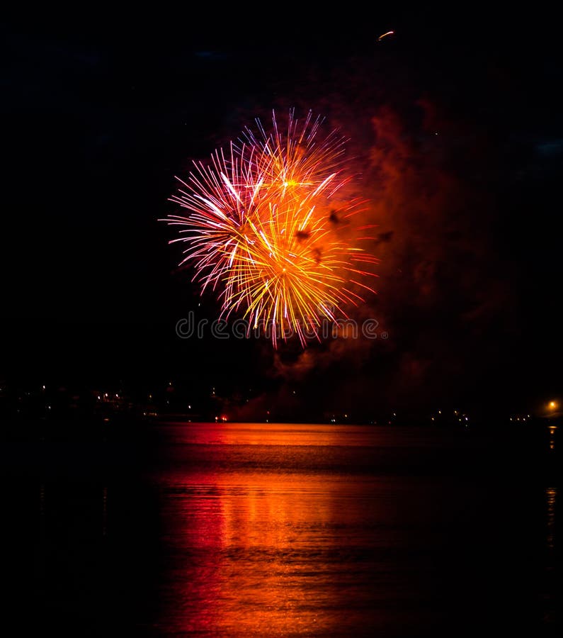 Vertical Shot of Big Colorful Fireworks in the Night Sky Stock Photo ...