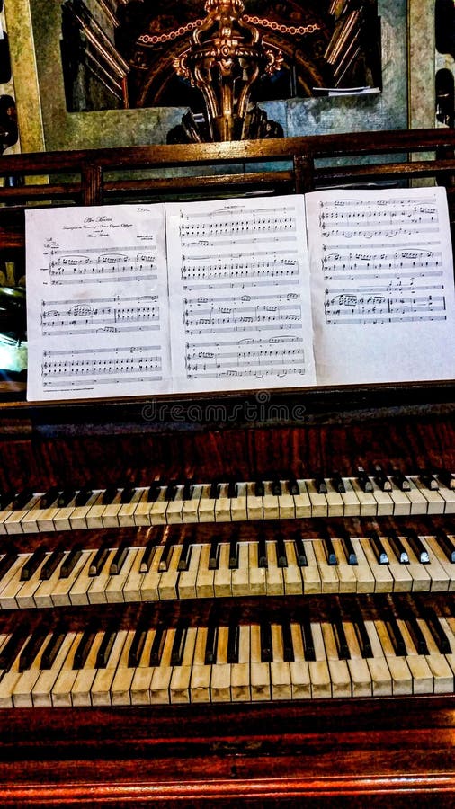 Vertical Shot of a Big Piano with Note Sheets Editorial Photography ...