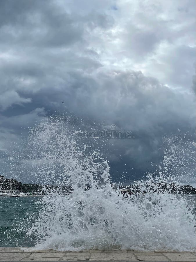 Vertical Shot of a Big Wave Hitting the Shore Stock Image - Image of ...