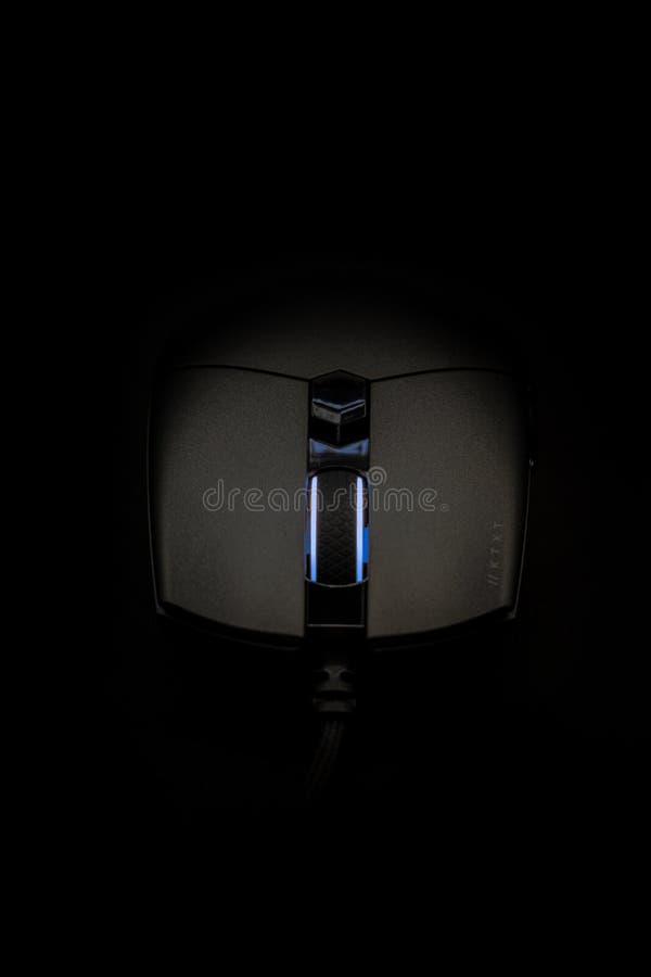 Vertical Shot of a Black Computer Mouse with Illuminated Neon Blue ...