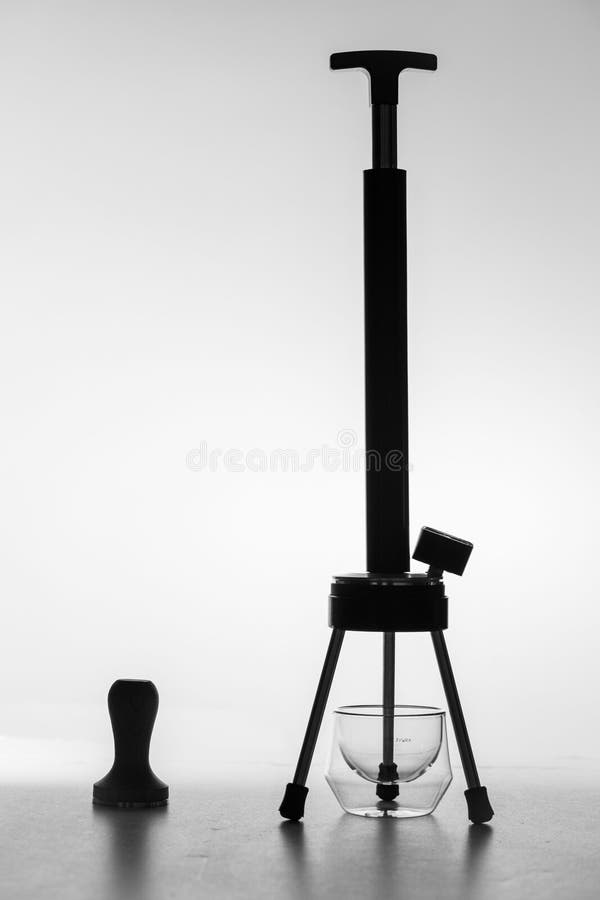 Vertical Shot of the Black Espresso Forge and Glass Accessories Against ...