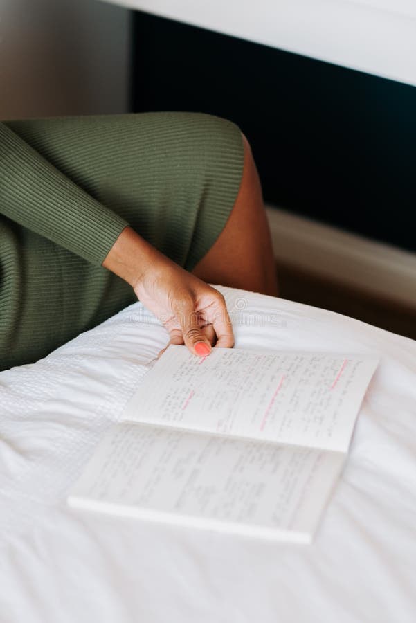 Vertical Shot of a Black Female Doing Notes with a Pen Stock Image ...