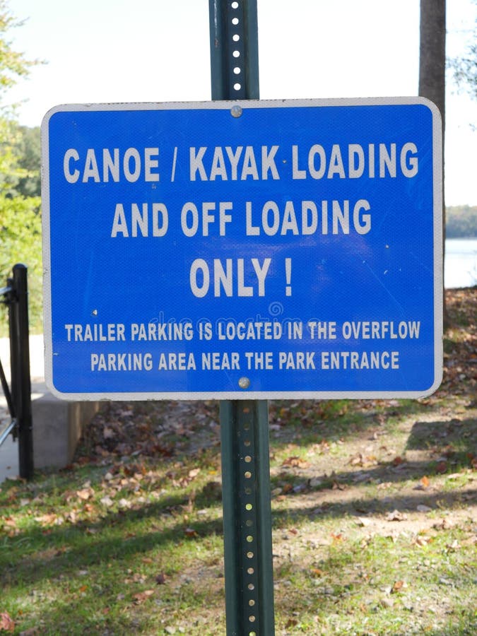 Vertical Shot of a Blue Sign with the Text Canoe/kayak Loading and Off ...