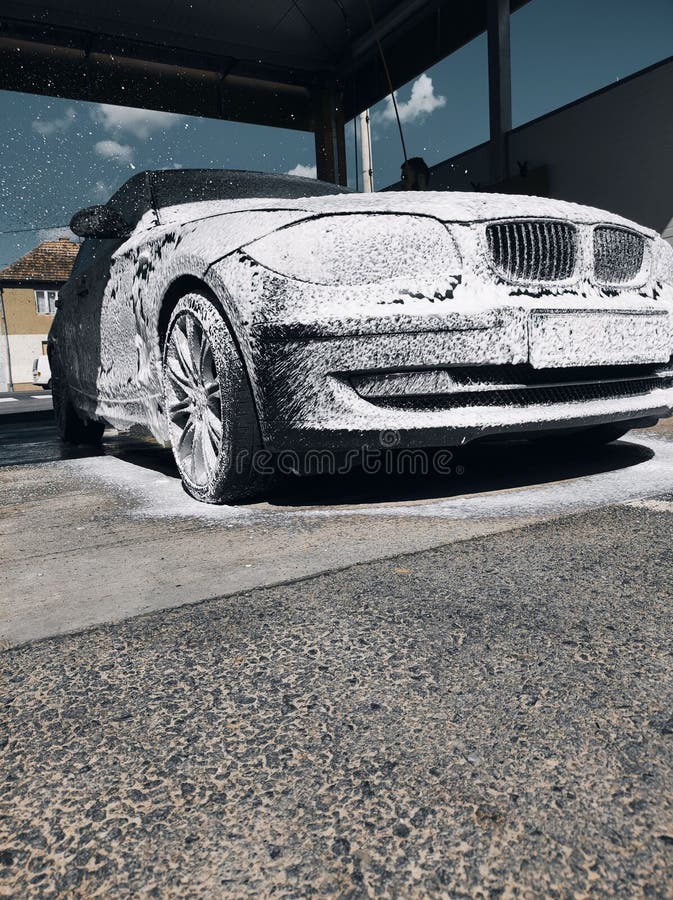 Vertical Shot of the BMW Car Washing Process Stock Photo - Image of ...
