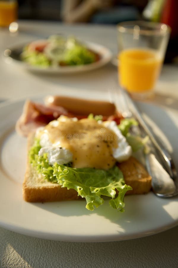 Egg benedict on a toast stock photo. Image of breakfast - 189959772