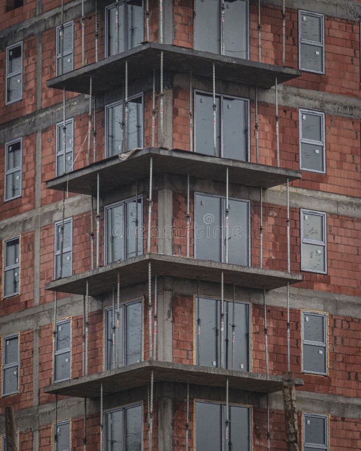 Vertical Shot of the Brick Semi-constructed Apartment Building with ...